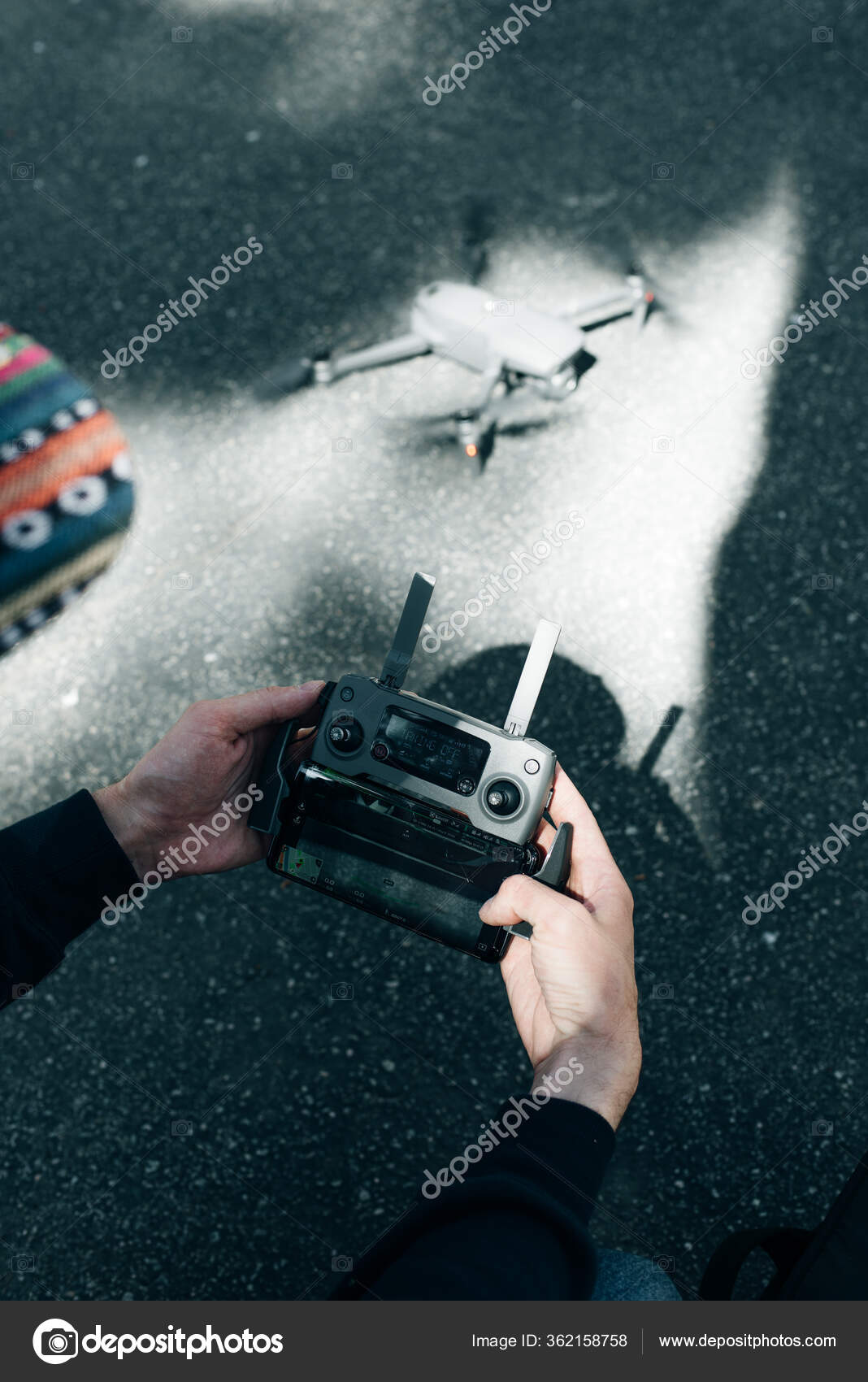 Drone remote control. Remote control in hand man. Man holds remote ...