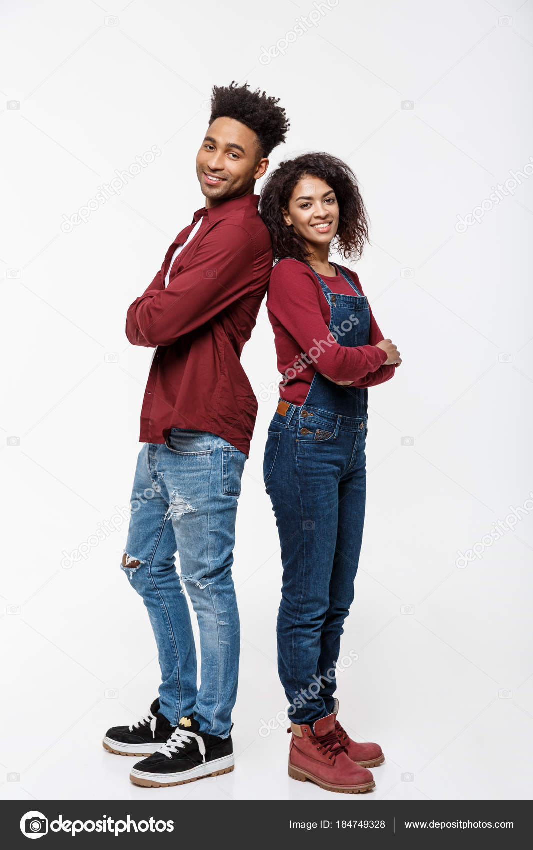 Woman Standing On Mans Back