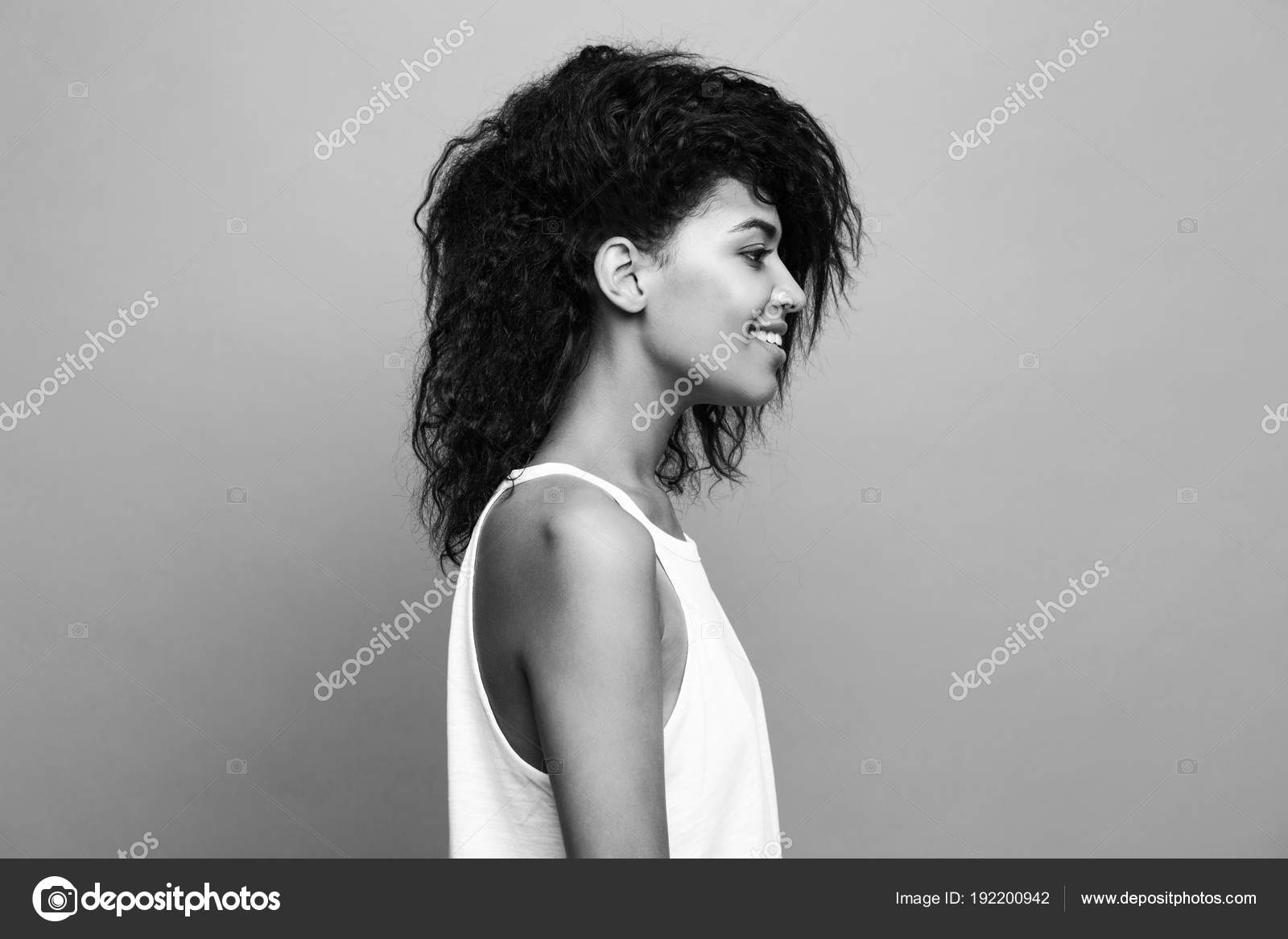 Side view portrait of beautiful attractive African American woman over ...