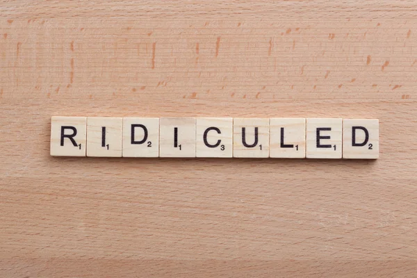 Scrabble letters spelling the word loathing. Stock Photo by ©Halfbottle ...