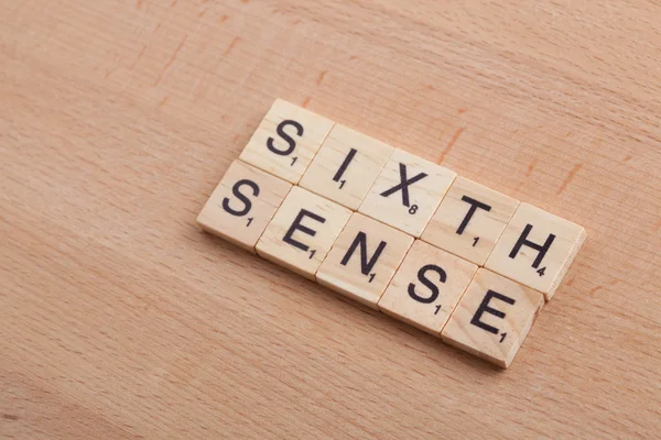 Scrabble letters spelling the word sixth sense. Stock Photo by ...