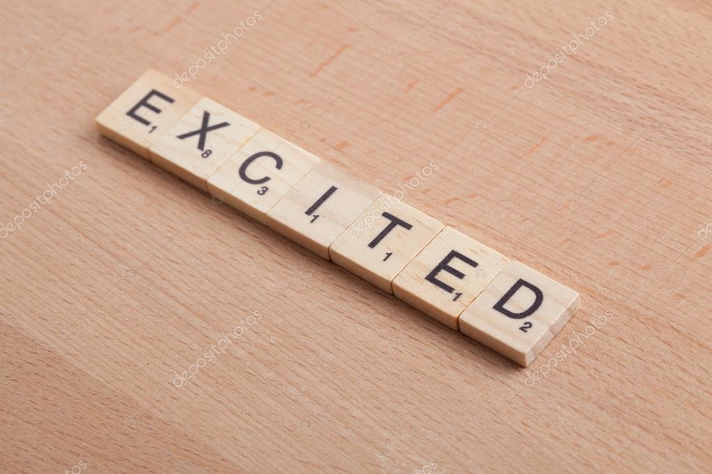 Scrabble letters spelling the word excited. Stock Photo by ©Halfbottle ...
