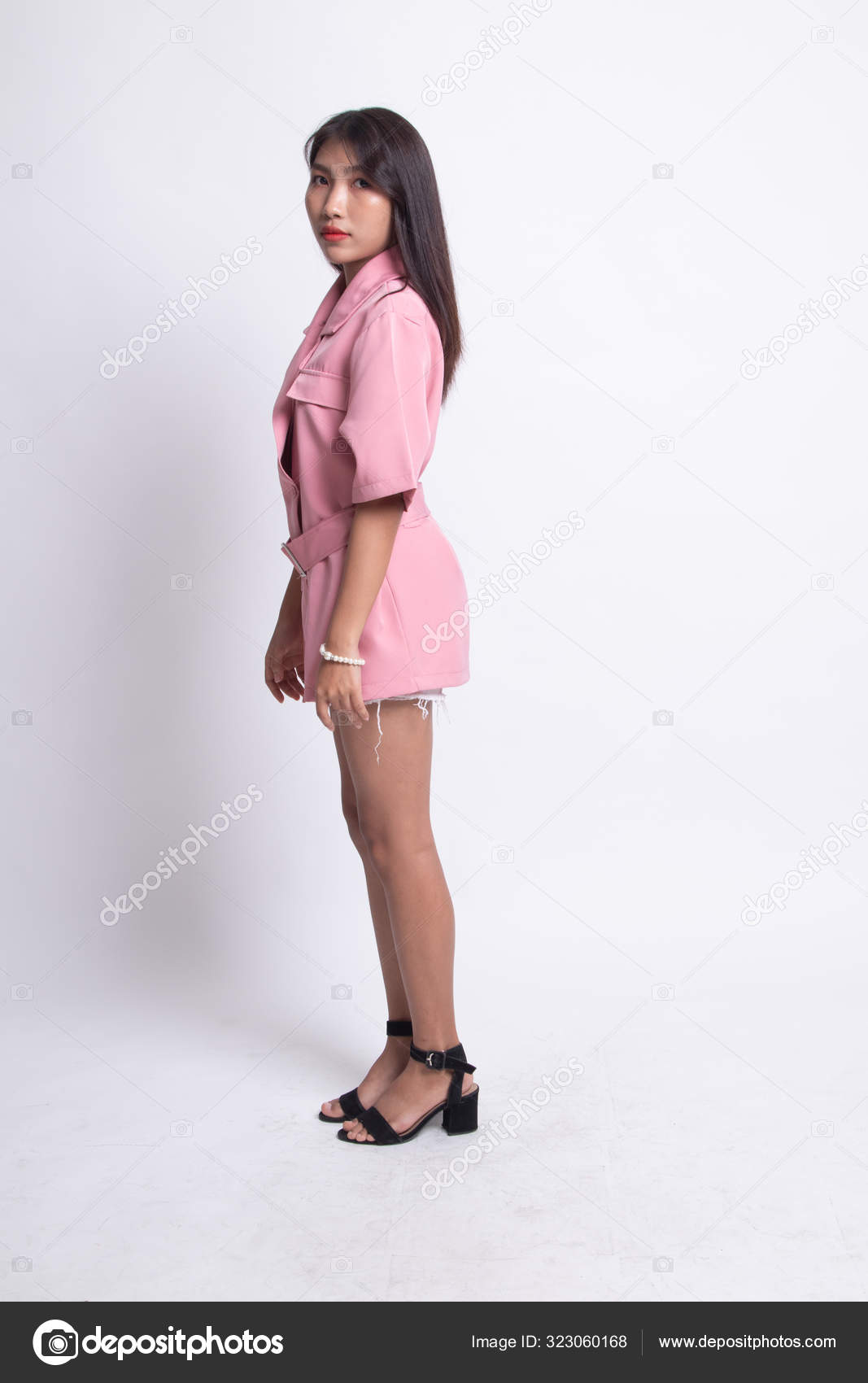 Full body side view of beautiful young asian woman. Stock Photo by ...