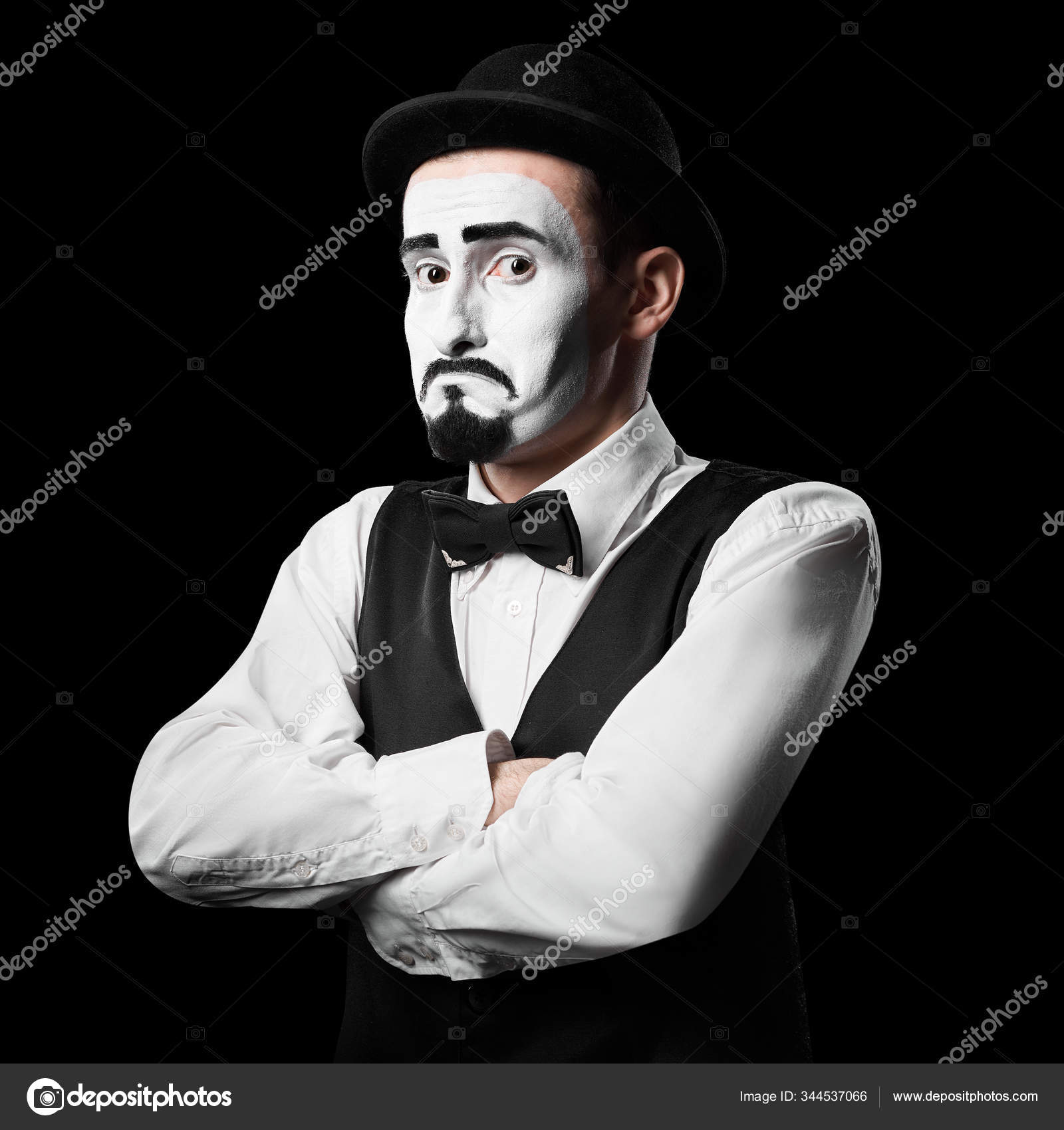 Mime artist shows sadness emotion. Isolated on black background. Stock ...