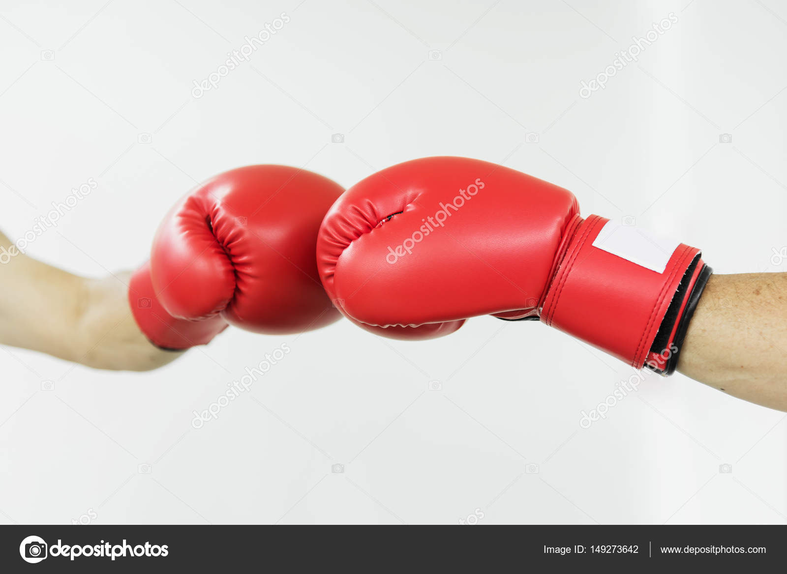 Fighter man punching with red boxing gloves. Boxing practicing. Stock ...