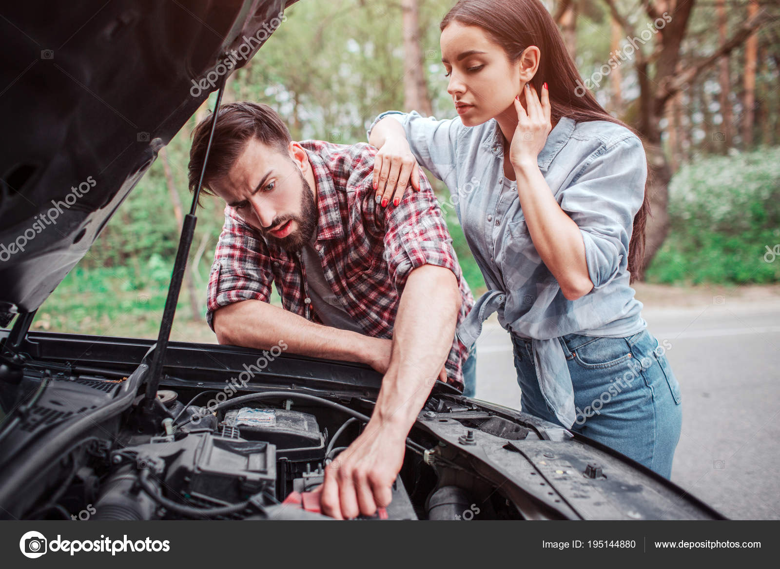 Man Fixing Car