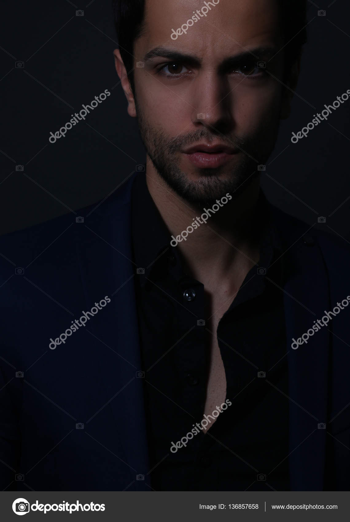 Dramatic portrait of an handsome man — Stock Photo © rdrgraphe #136857658