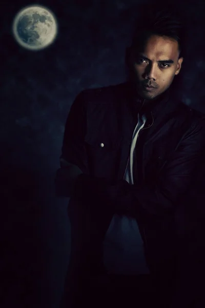 A vampire story. Handsome vampire wearing a black leather jacket Stock ...