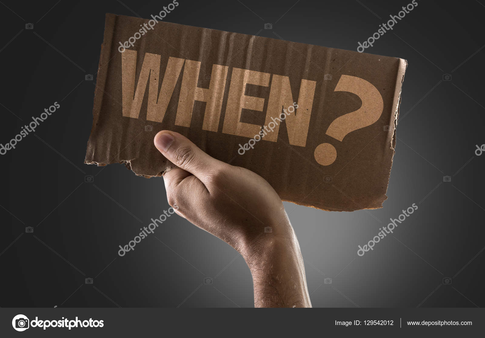 Cardboard with sign When? Stock Photo by ©gustavofrazao 129542012