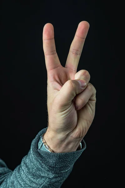 Human hand showing signs. isolated on black Stock Photo by ...