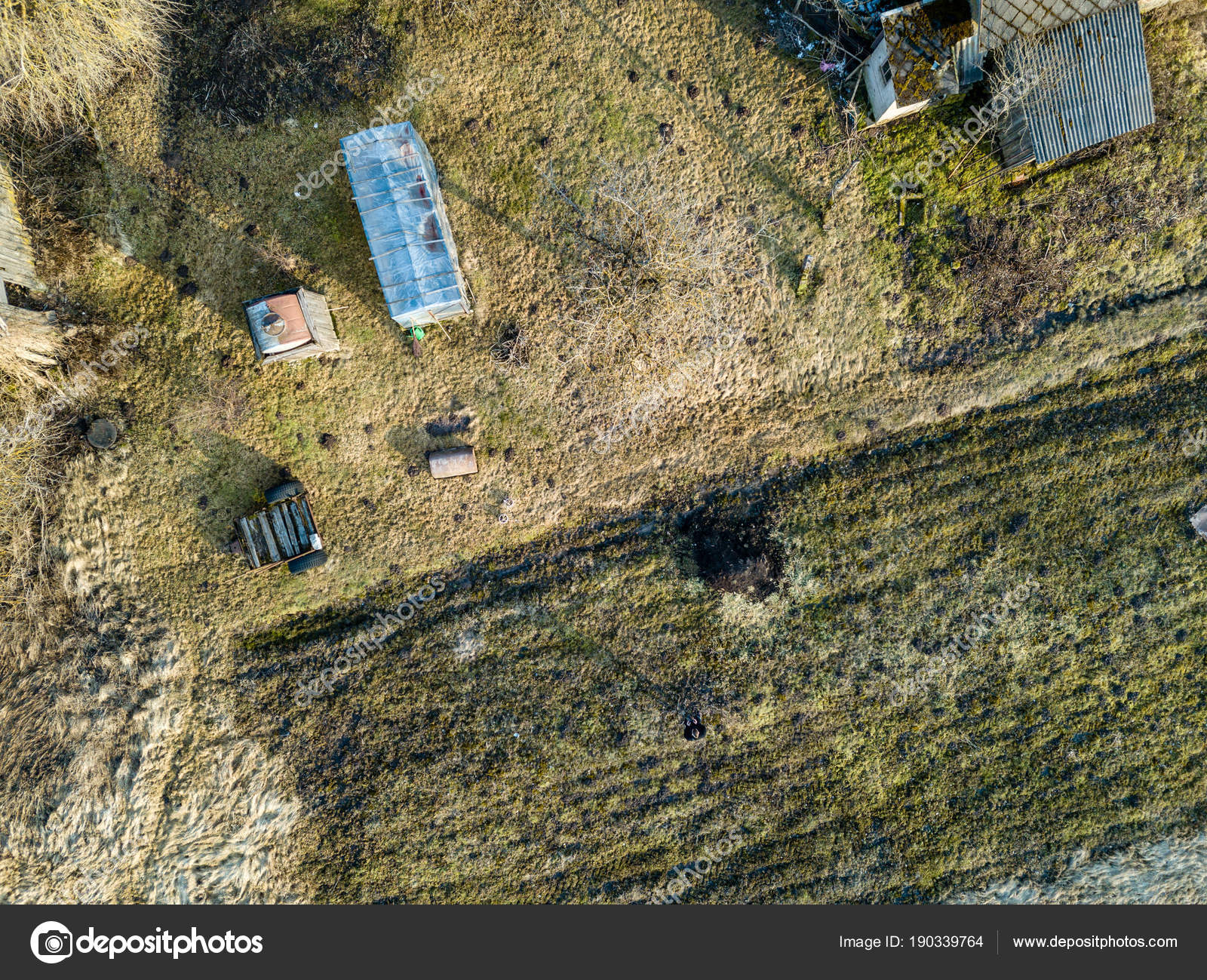 Drone image. aerial view of rural area with houses and road netw ...
