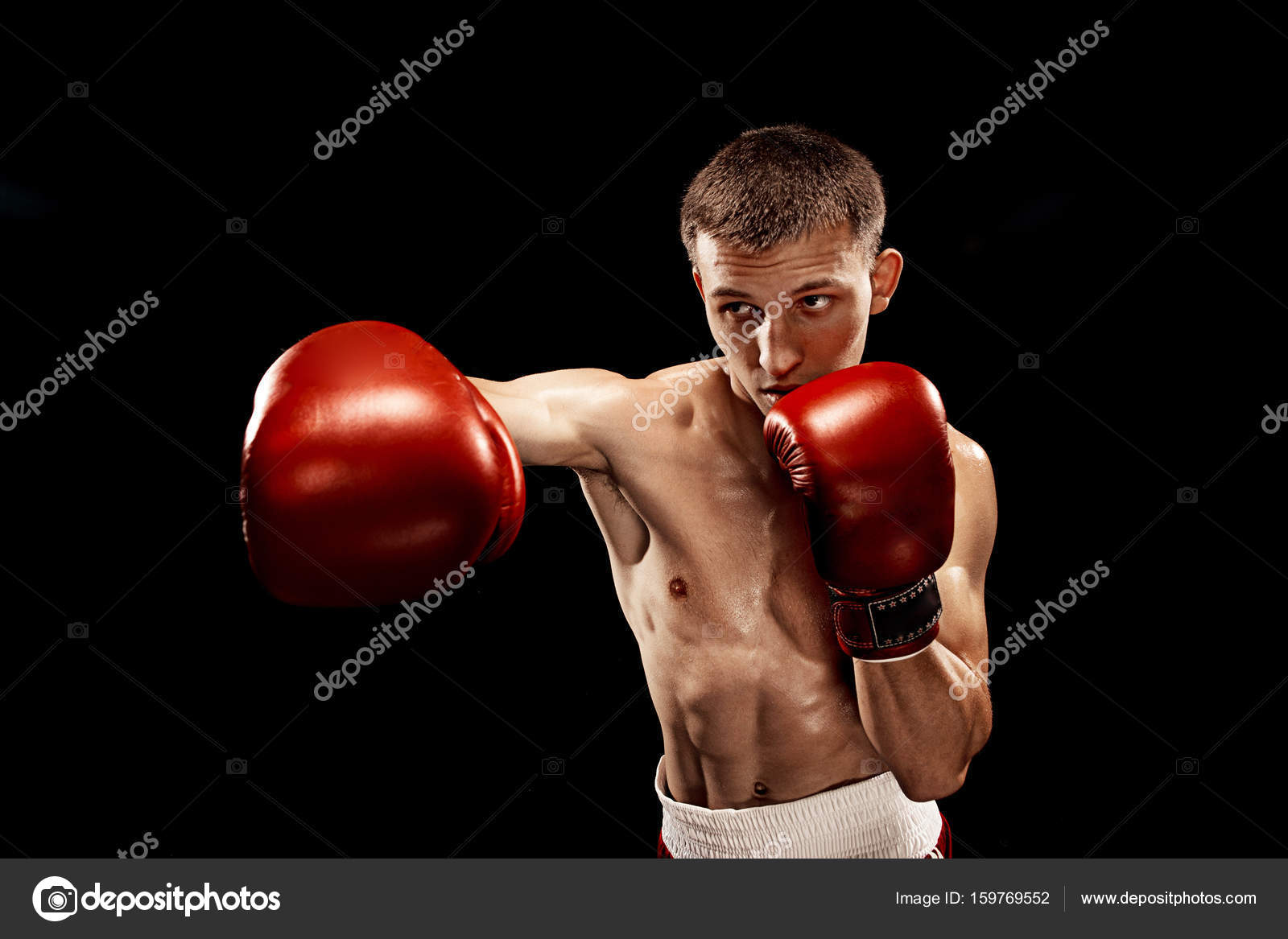 Male boxer boxing with dramatic edgy lighting in a dark studio — Stock ...