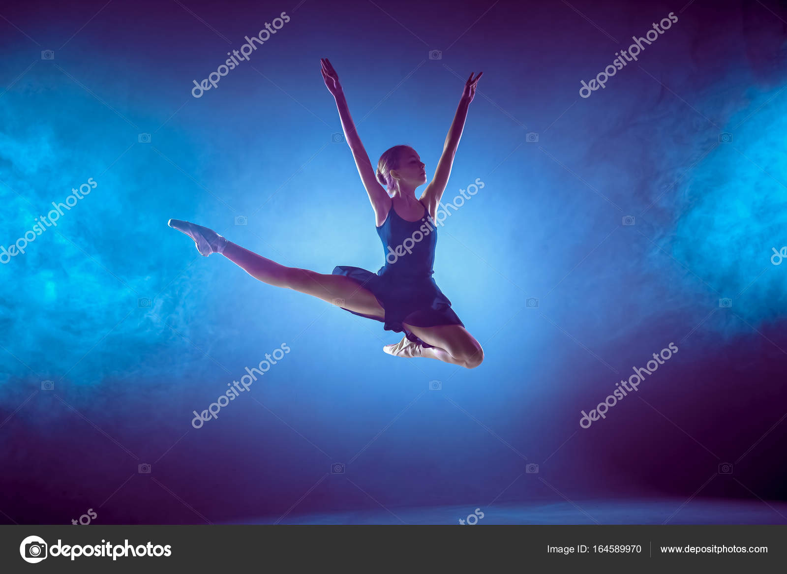 Beautiful young ballet dancer jumping on a lilac background. — Stock ...