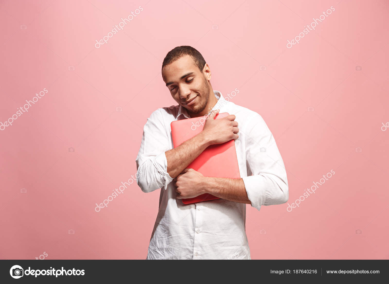 Businessman hugging laptop Stock Photo by ©vova130555@gmail.com 187640216