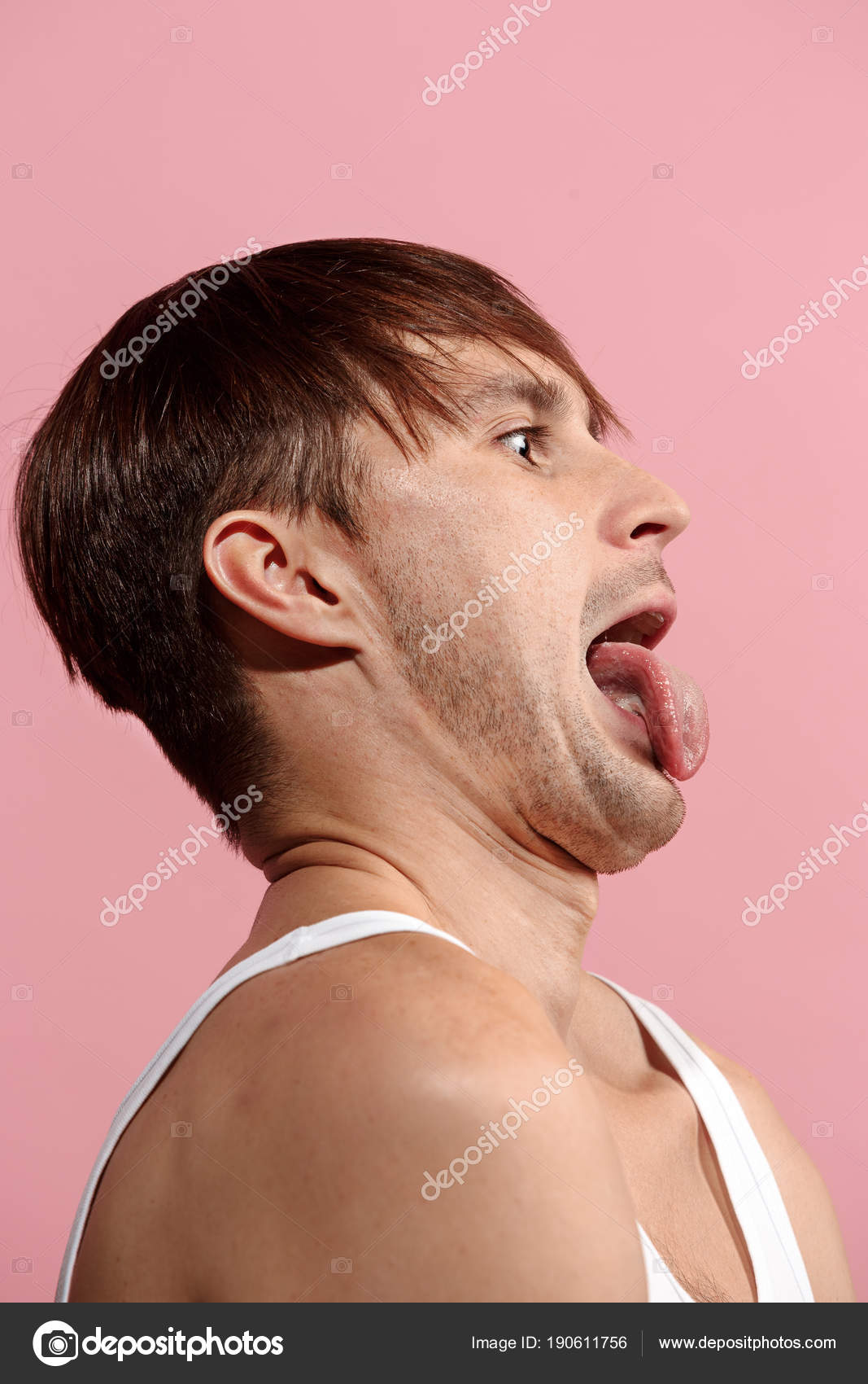 The squint eyed man with weird expression isolated on pink Stock Photo ...