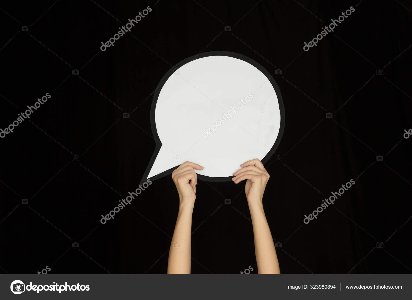 Hands holding the sign of comment on black studio background — Stock ...