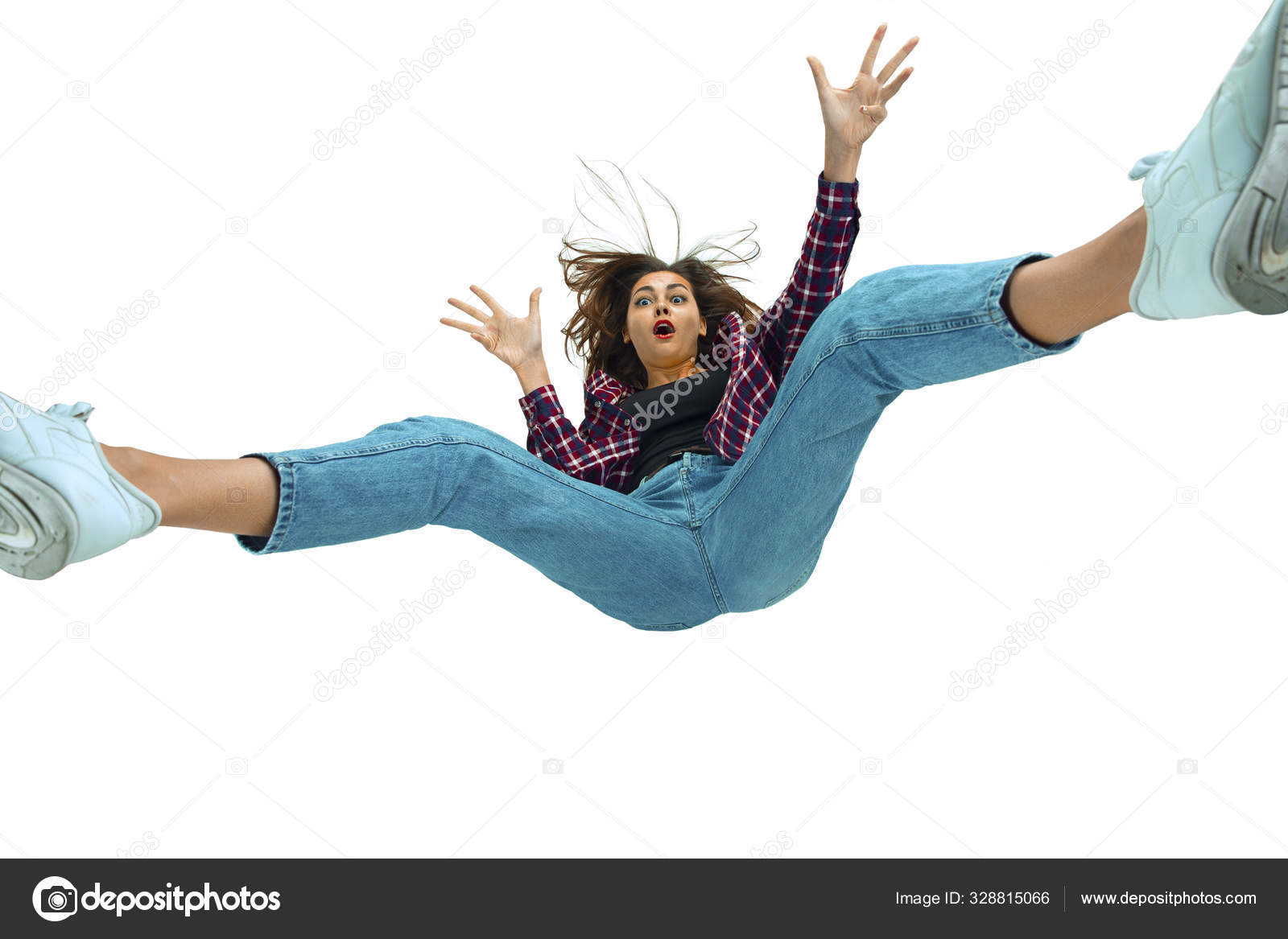 A second before falling - young girl falling down with bright emotions ...
