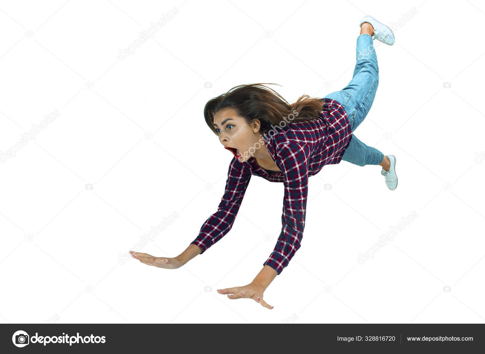 A second before falling - young girl falling down with bright emotions ...