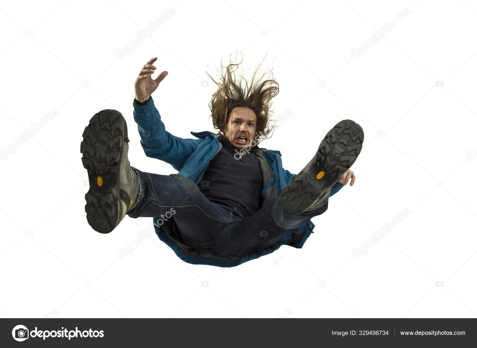 A second before falling - young man falling down with bright emotions ...