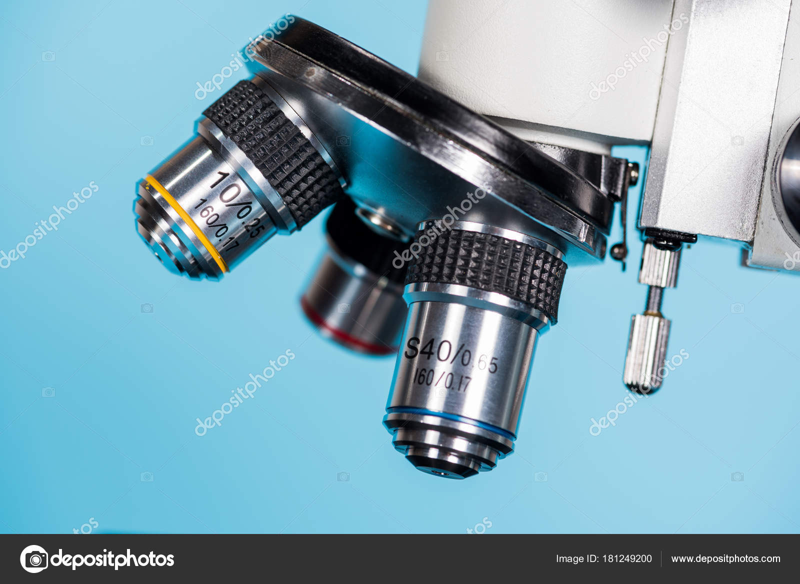 Close up of microscope len on light blue background — Stock Photo ...