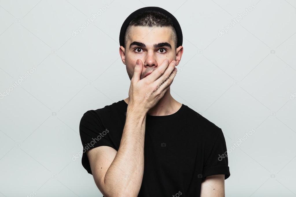 Studio portrait of suprised man Stock Photo by ©kkolosov 126877770