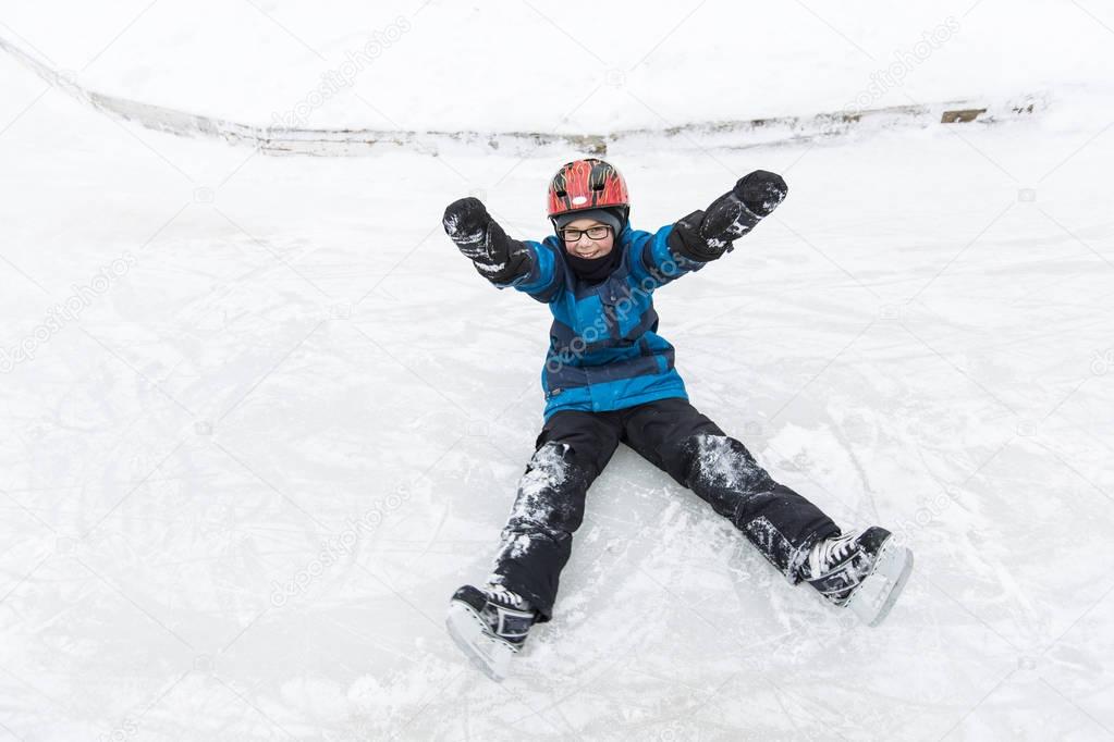 Little boy enjoying ice skating in winter season — Stock Photo © Lopolo ...