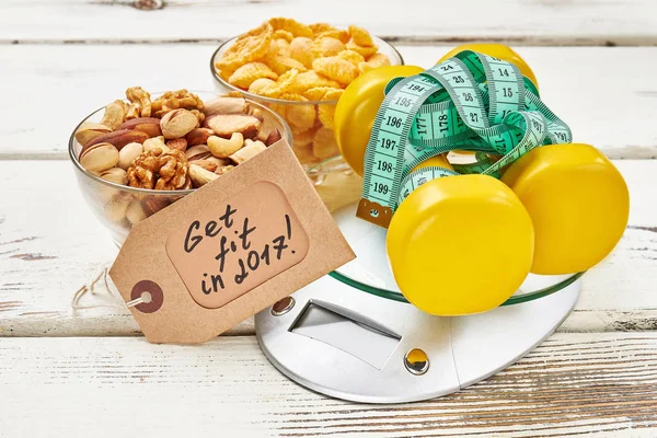 Kitchen scales and measuring tape. - Stock Image - Everypixel