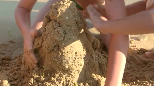 Kids building a sand structure. — Stock Video © Denisfilm #151786292
