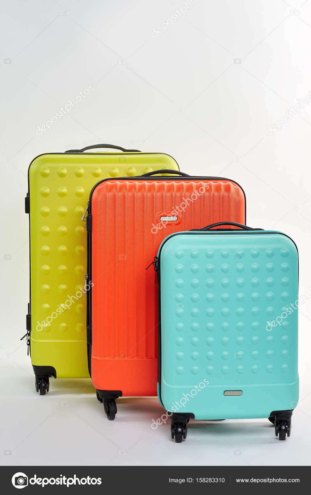 Set of different summer suitcases. — Stock Photo © Denisfilm #158283310