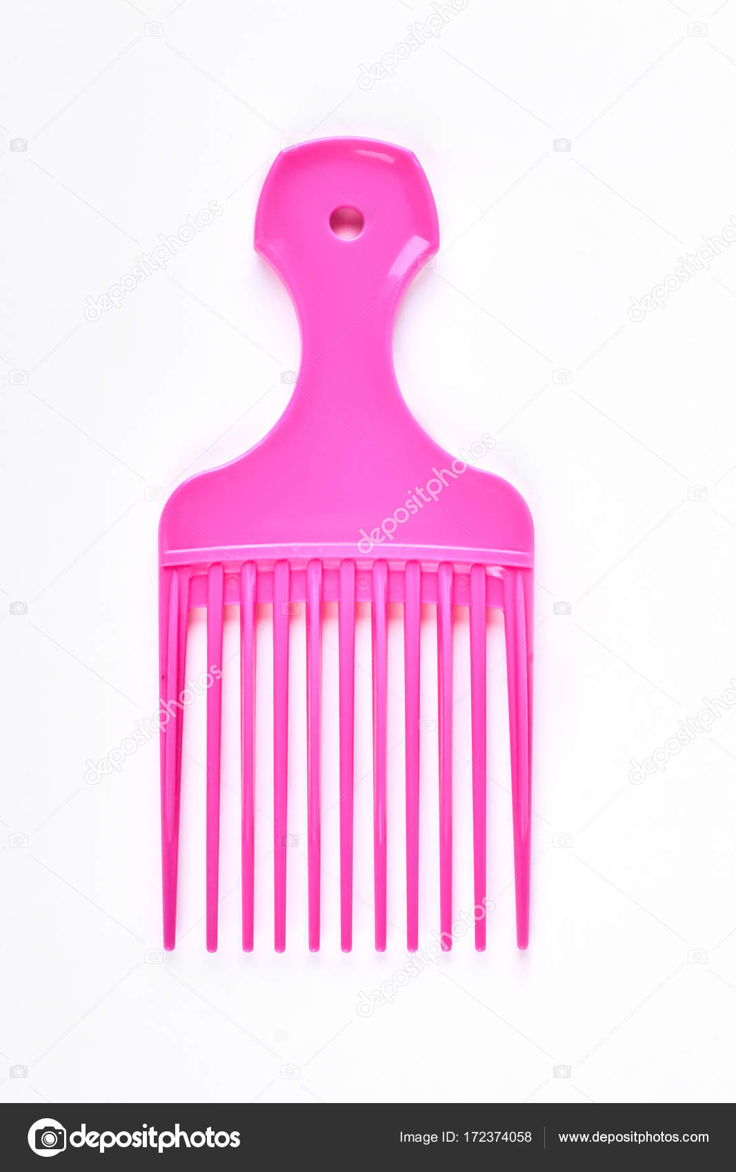 Pink professional afro comb. — Stock Photo © Denisfilm #172374058