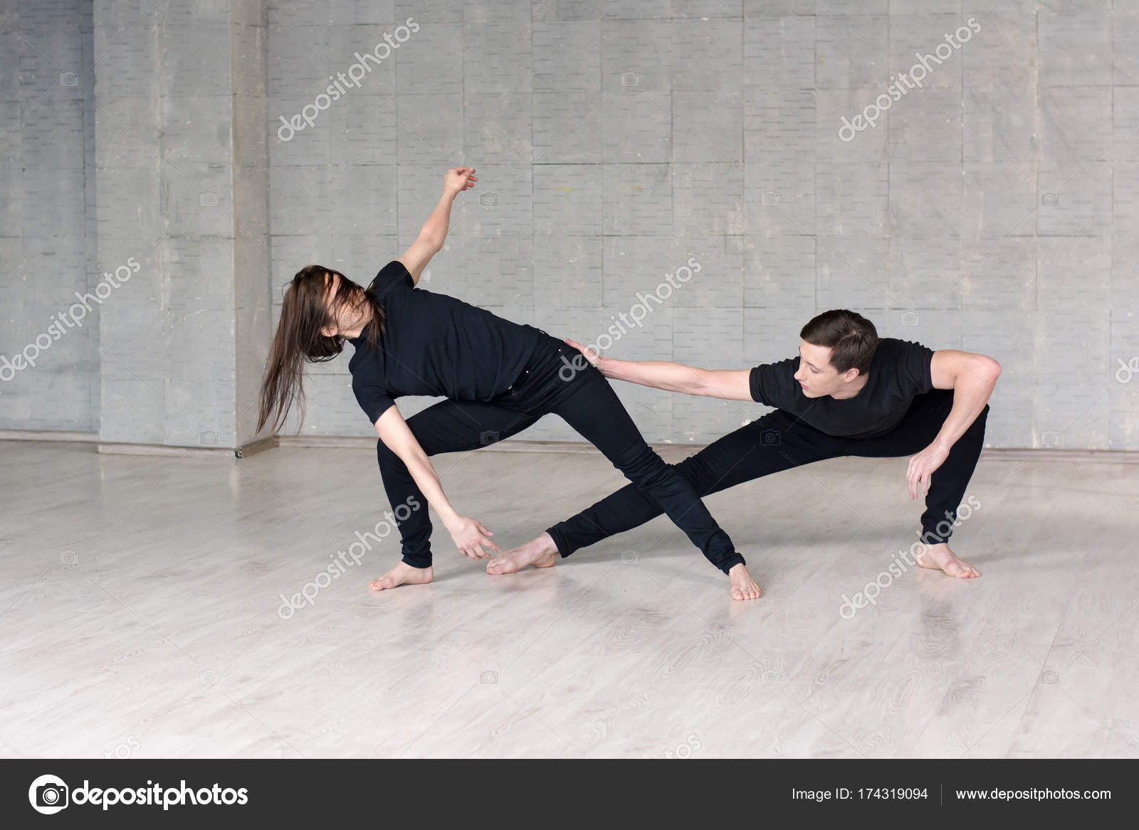 Young couple practising dance skills. Stock Photo by ©Denisfilm 174319094