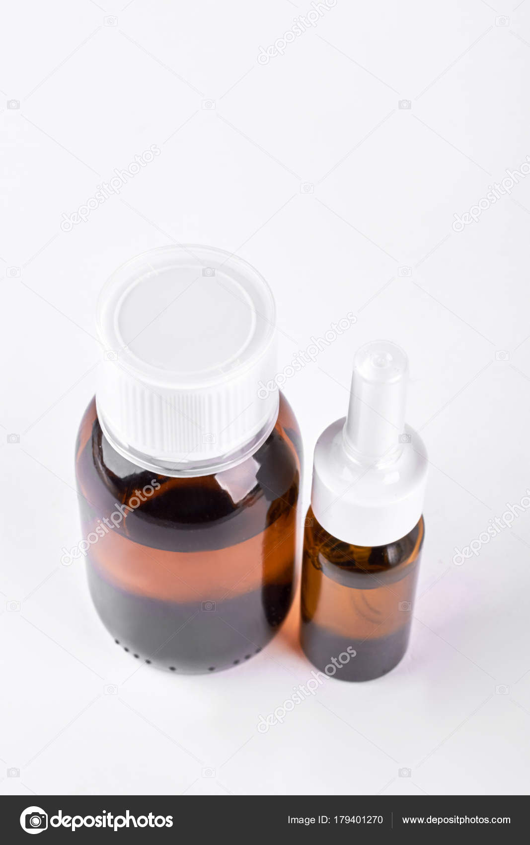 Cough syrup and nasal spray, top view. Stock Photo by ©Denisfilm 179401270