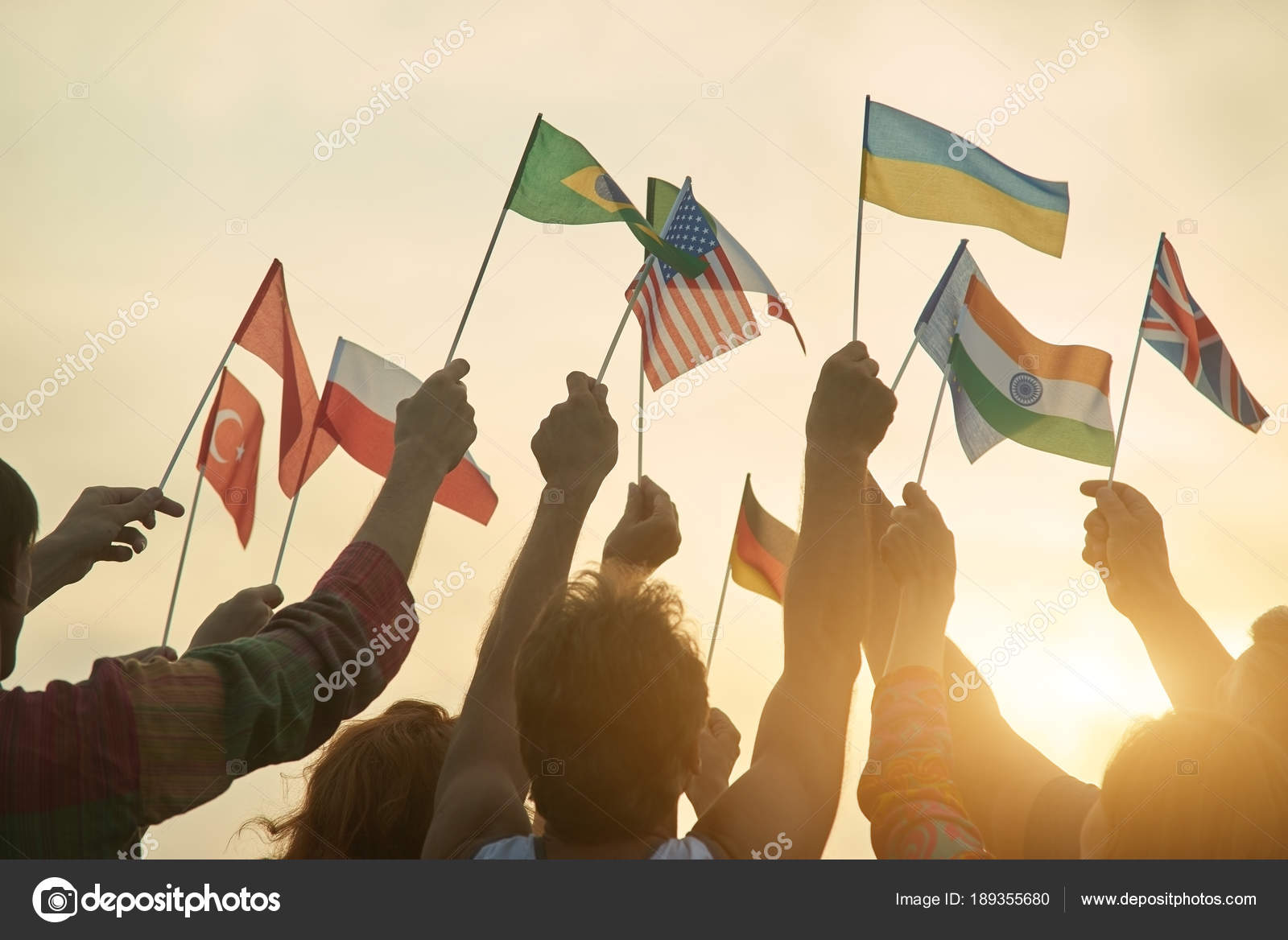 Group of people with various flags. Stock Photo by ©Denisfilm 189355680