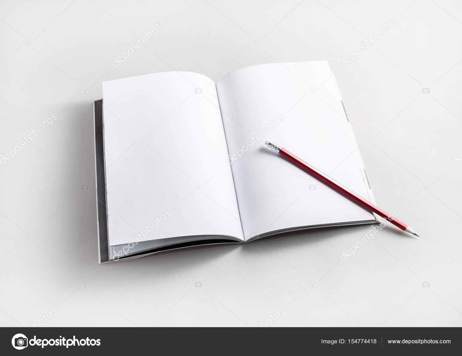 Brochure and pencil Stock Photo by ©Veresovich 154774418