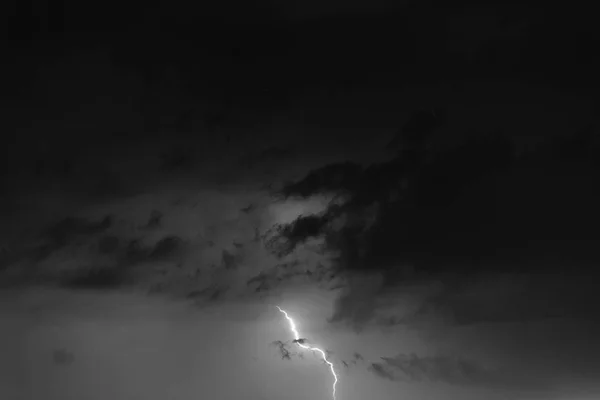 Lightning against a black background Stock Photos, Royalty Free ...