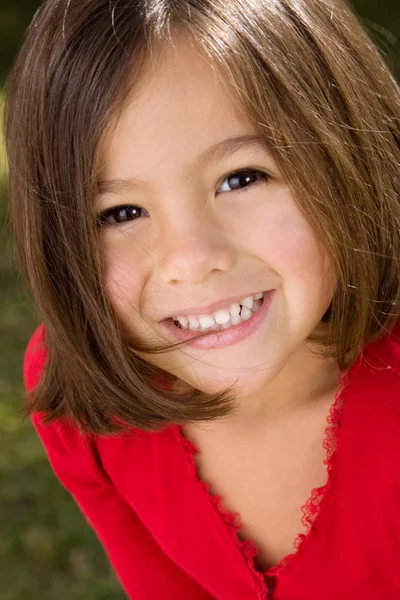 Portrait of a happy Hispanic little girl smiling. — Stock Photo ... Portrait of a happy Hispanic little girl smiling. — Stock Photo ...