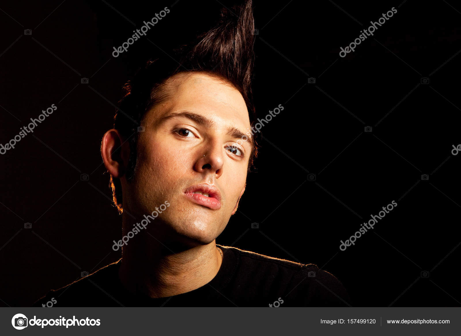 Young punk rocker staring and looking mean. — Stock Photo ...