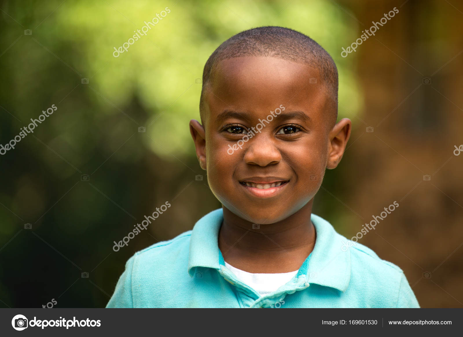 Cute little boy smiling. Stock Photo by ©pixelheadphoto 169601530