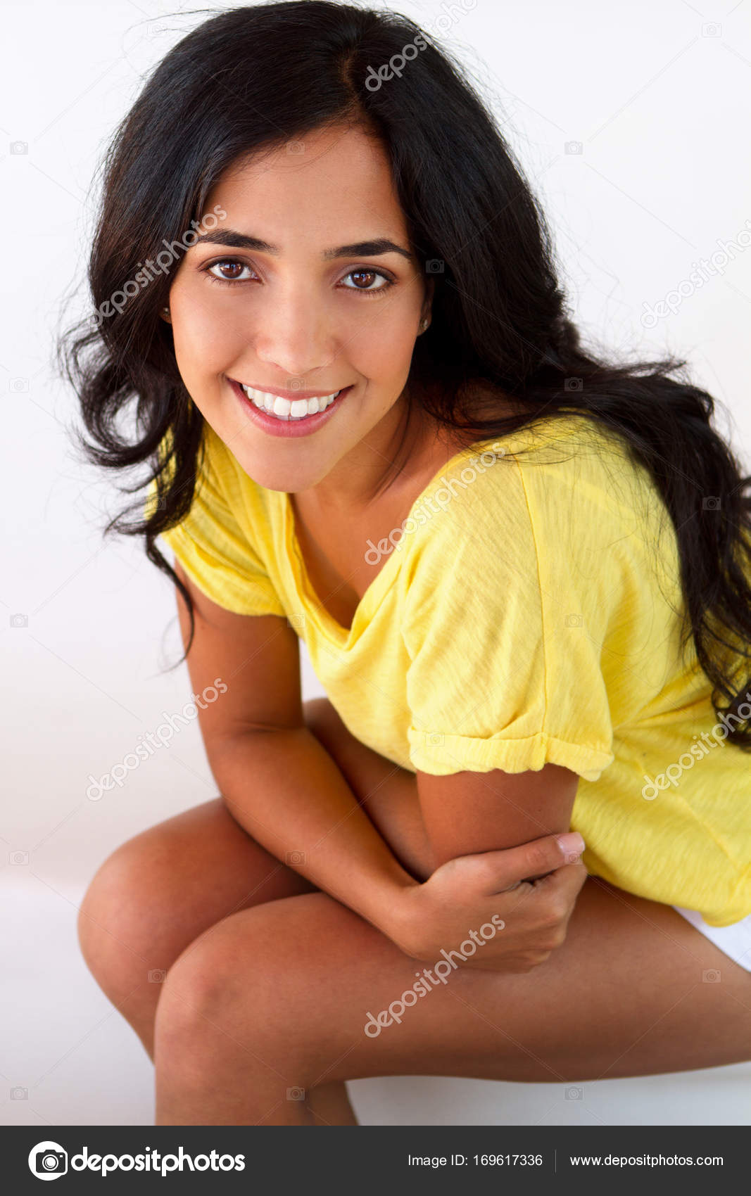 Young beautiful hispanic woman smiling. — Stock Photo © pixelheadphoto ...