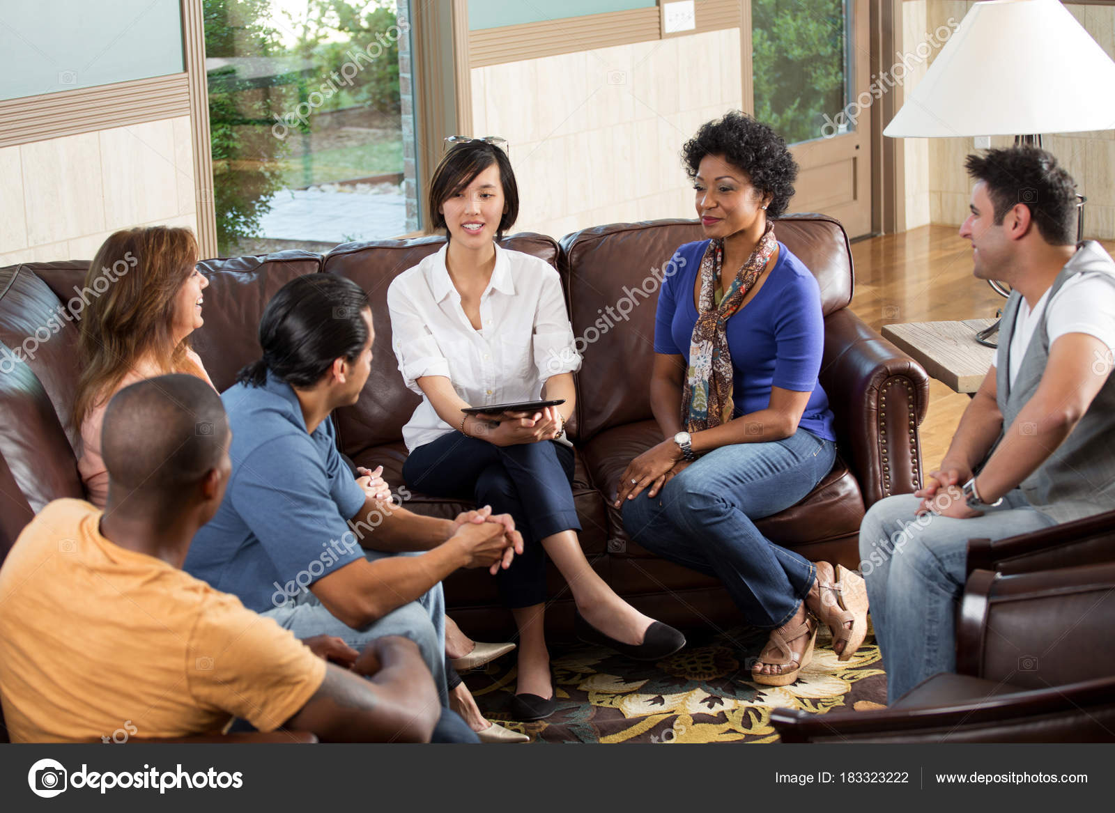Small community group in a support group. Stock Photo by ...