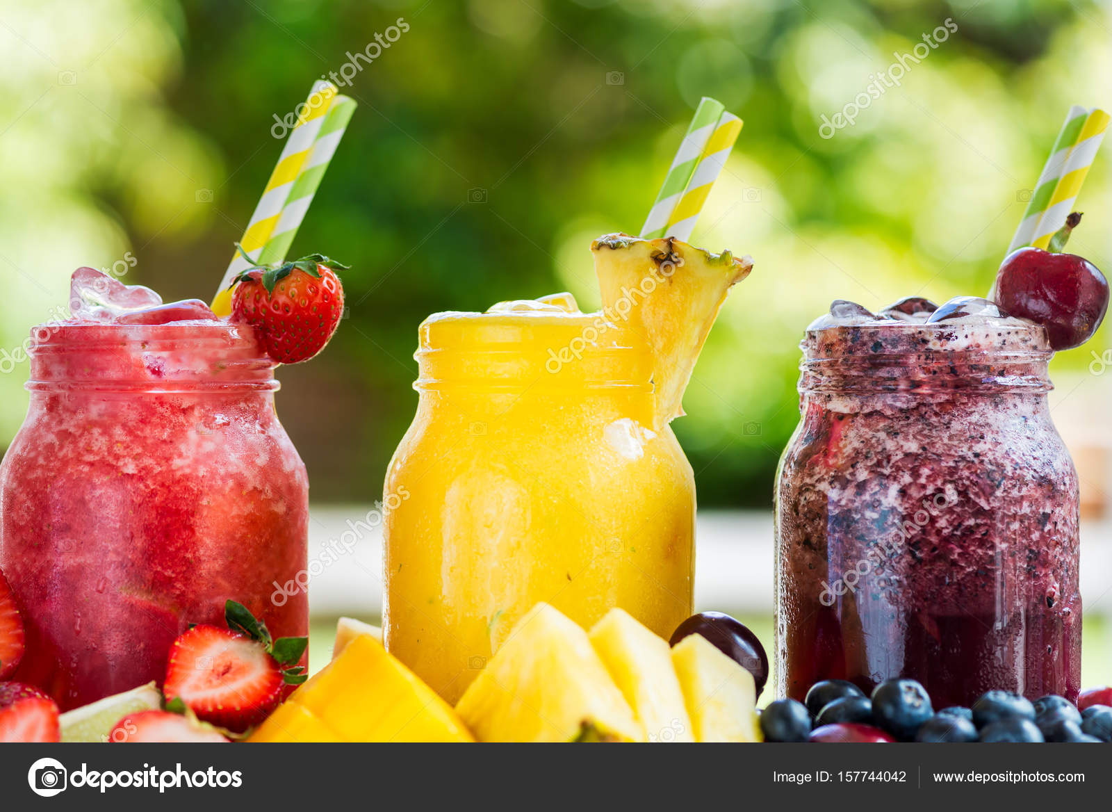 3 delicious slushies from different berries and fruits Stock Photo by ...