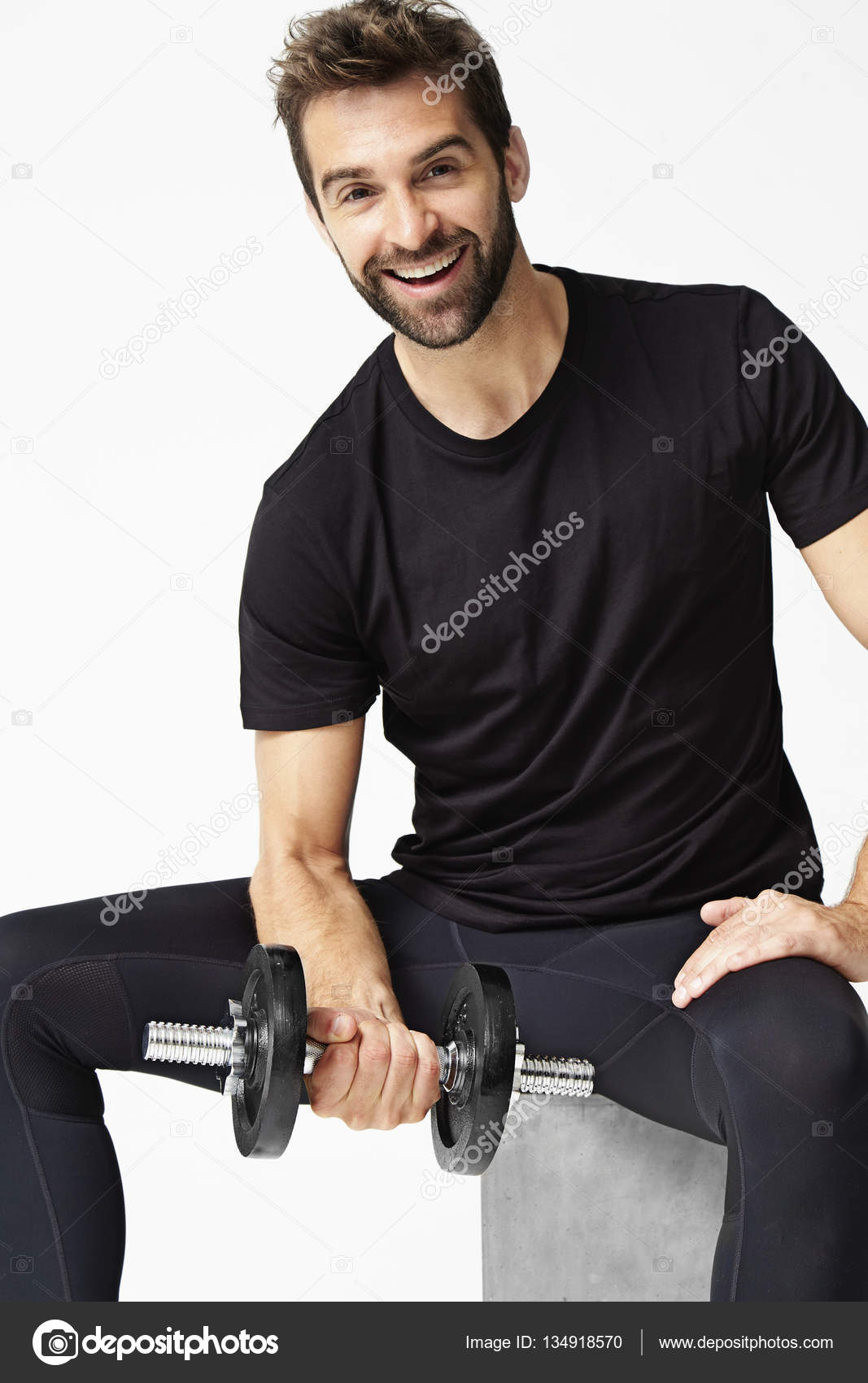 Handsome man lifting weight — Stock Photo © sanneberg #134918570