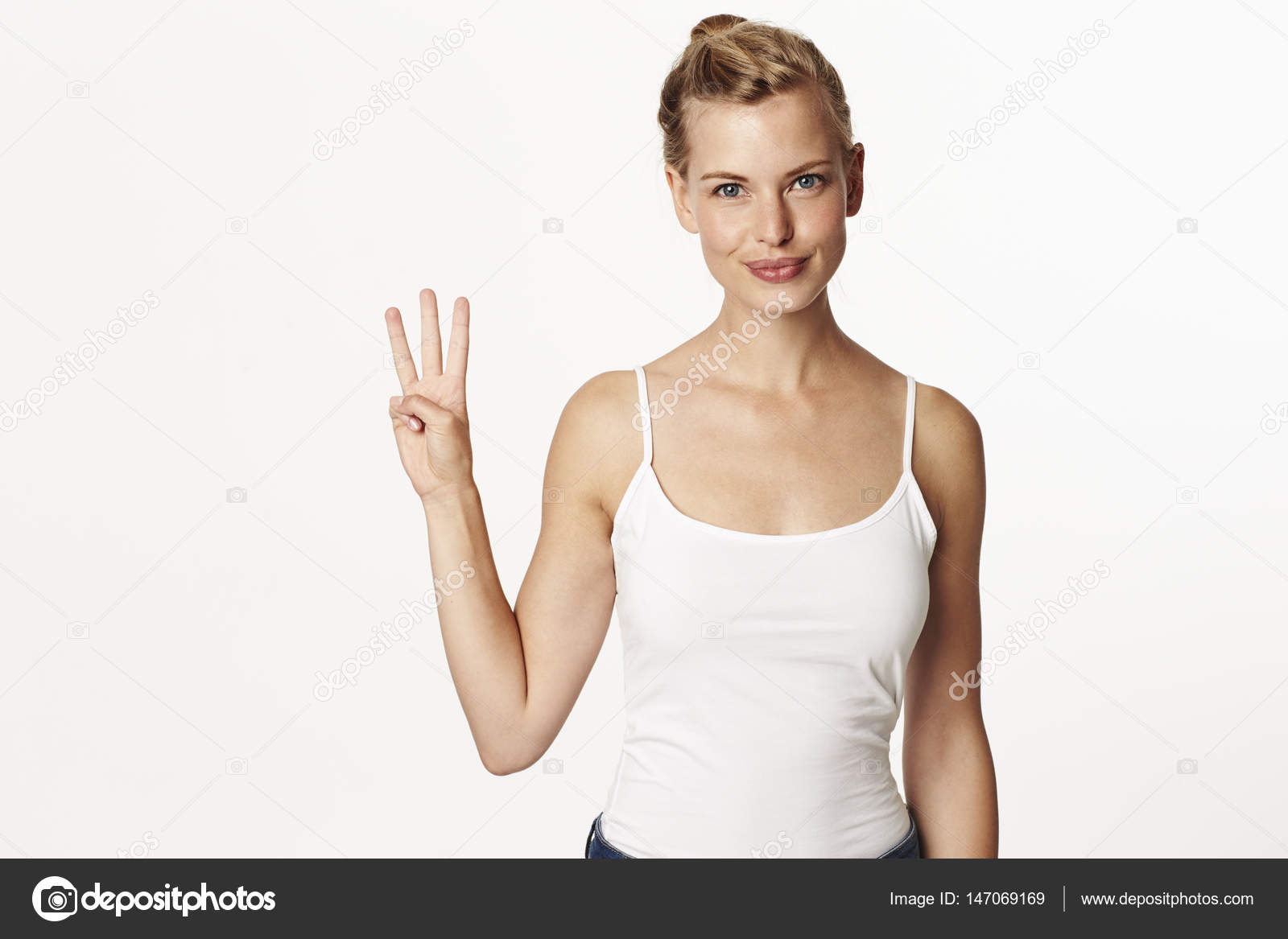 Woman holding up three fingers Stock Photo by ©sanneberg 147069169 Woman holding up three fingers Stock Photo by ©sanneberg 147069169