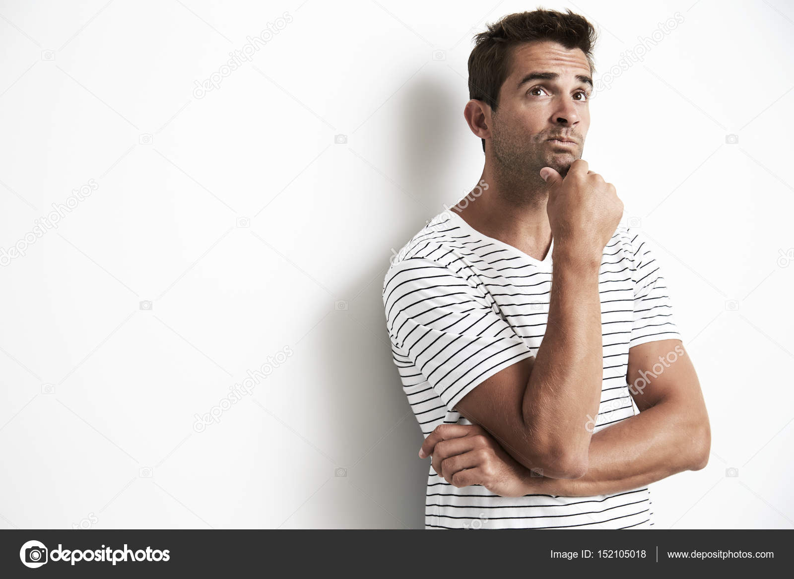 Man doing thinking gesture Stock Photo by ©sanneberg 152105018