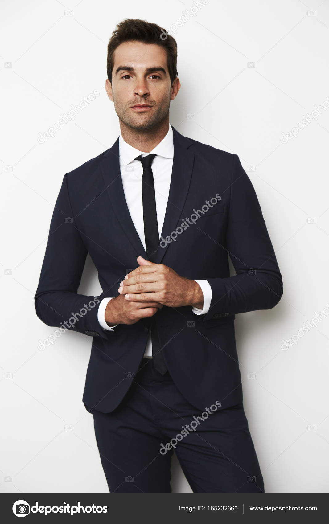Sharp dressed handsome young man Stock Photo by ©sanneberg 165232660