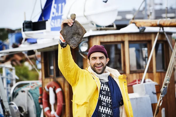 Fisherman with catch of fish Stock Photo by ©sanneberg 167517490