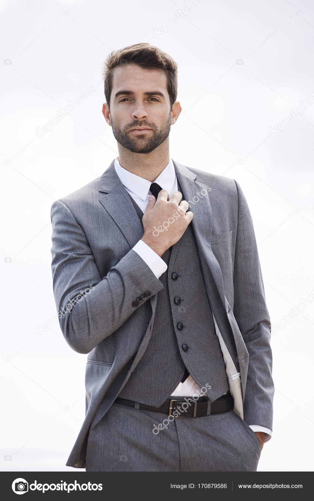 Seriously handsome businessman in grey suit Stock Photo by ©sanneberg ... Seriously handsome businessman in grey suit Stock Photo by ©sanneberg ...