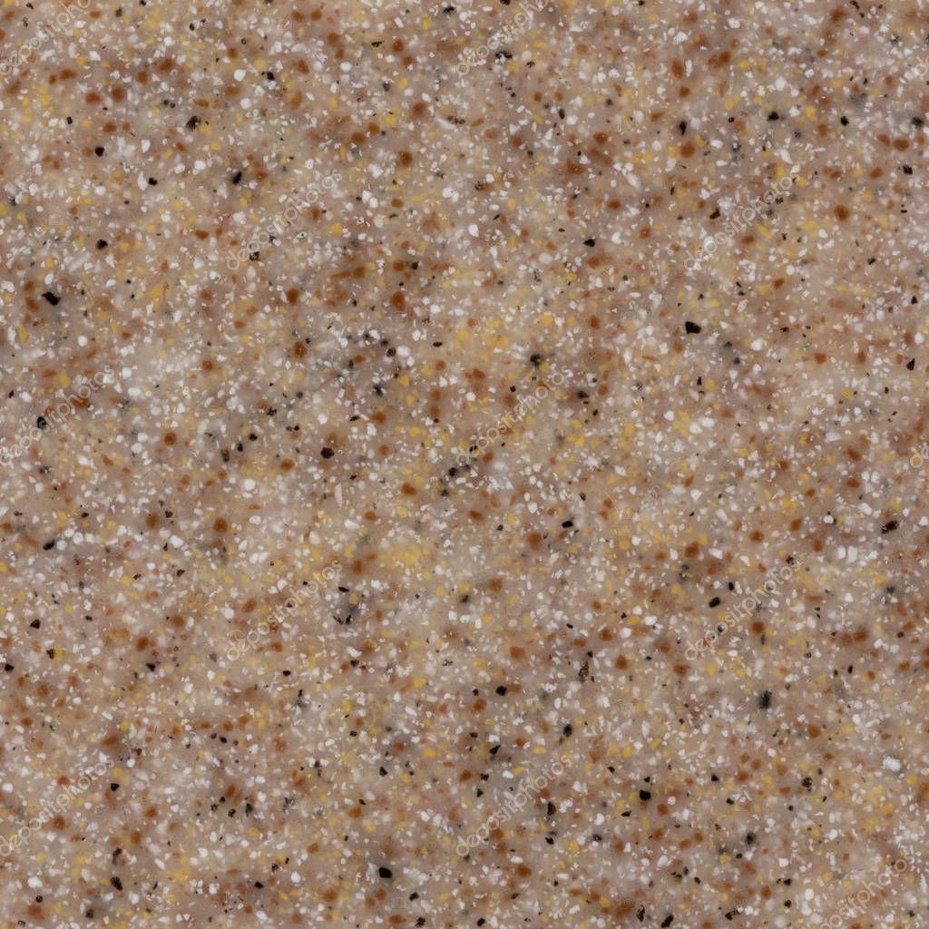 Textura de mármol artificial beige, que es parte de la pared. 2025
