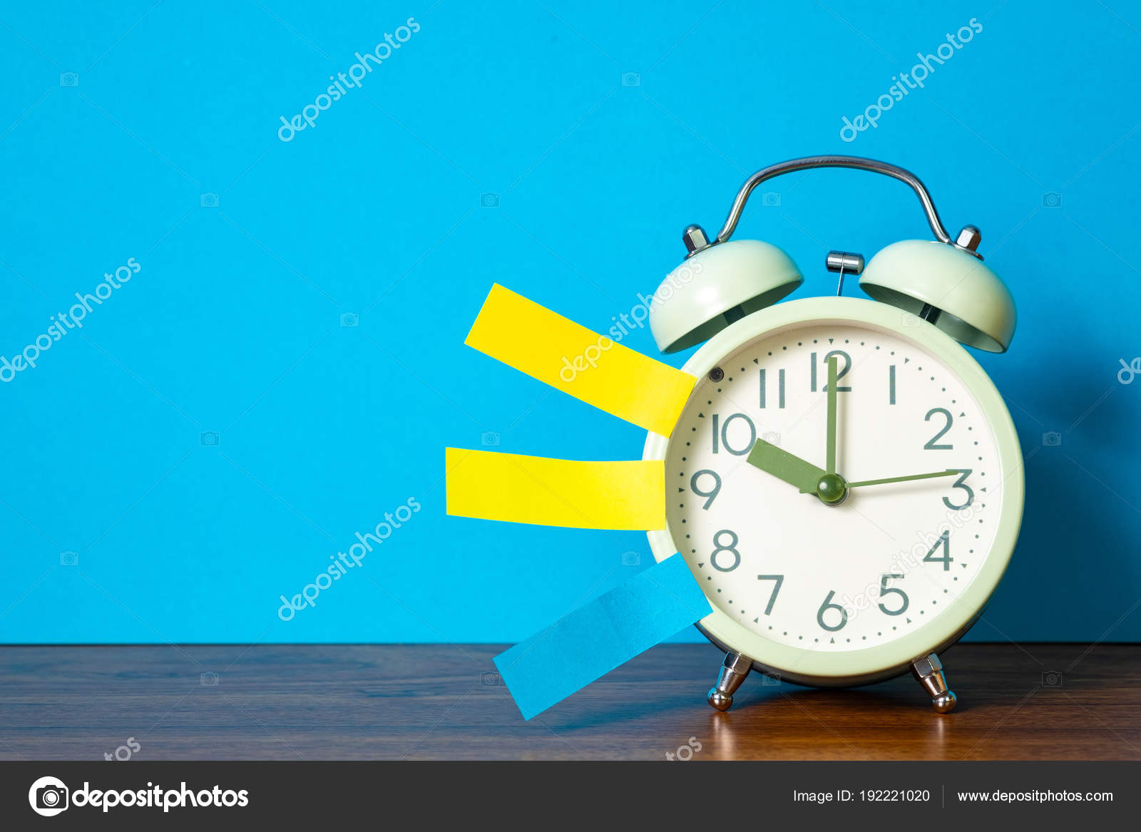 Post it note paper sticky and vintage alarm clock on table with — Stock ...