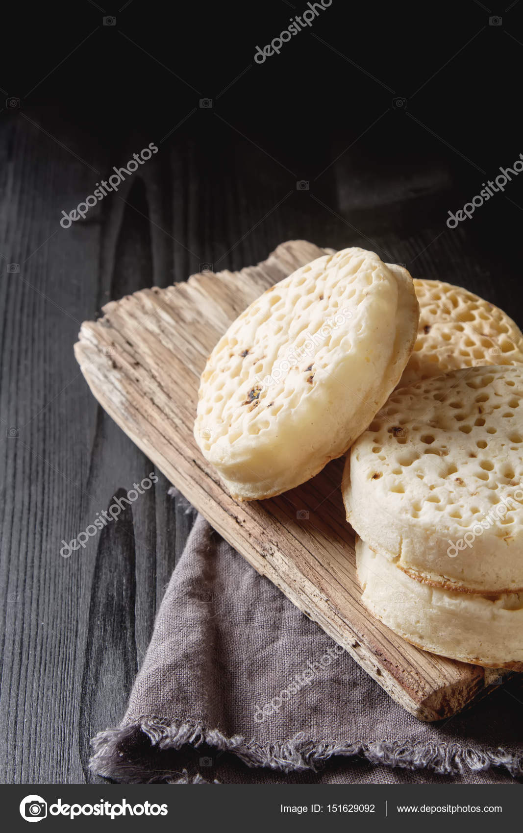 Hot Home made toasted crumpets served with honey and jams. Dark Stock ...